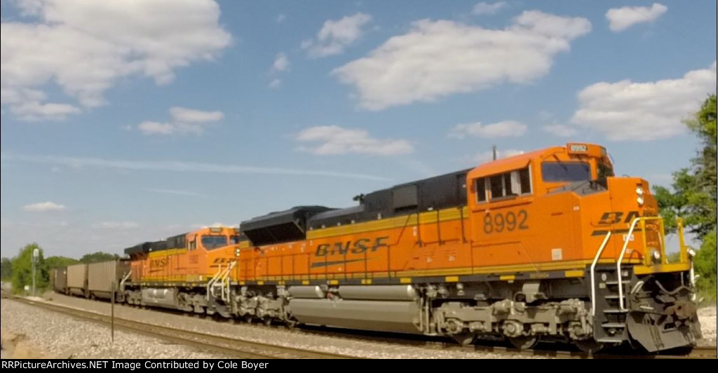 BNSF 8992 leads westbound empty coal train